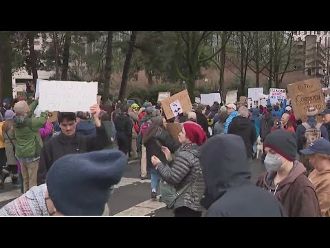 '50501' protesters block street in front of Portland City Hall