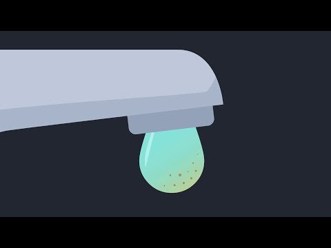 What causes tap water to appear brownish?