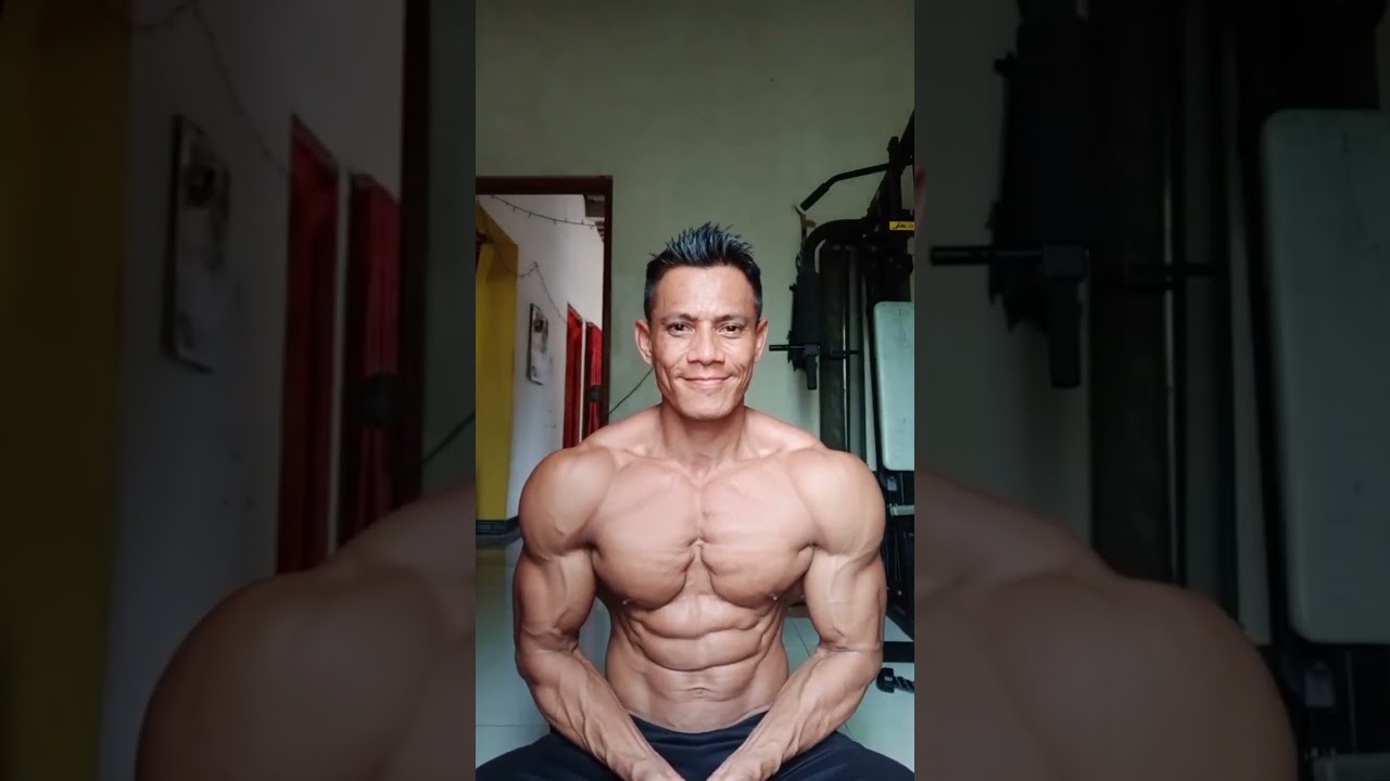 Indonesian muscular bodybuilder showing his muscles #flexing #asia #sixpack
