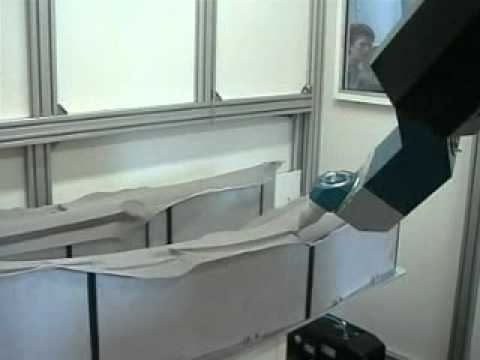 2 25 CT laser auto interior RoboCut IRB4400 RobotTechnology Lear DE