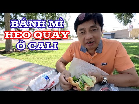 Ngồi Công Viên Westminster mát mẻ ăn ổ BÁNH MÌ HEO QUAY tràn bờ đê của tiệm bán đủ loại thức ăn VN.