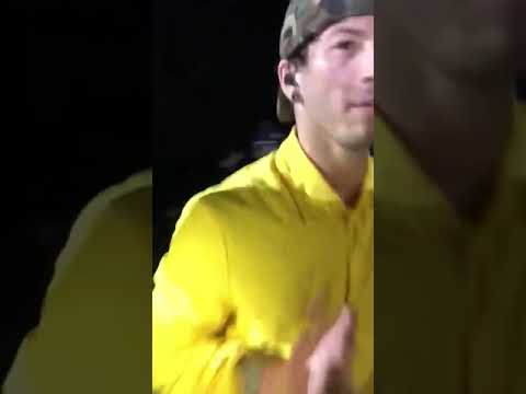 josh dun sticks his tongue out at his fans