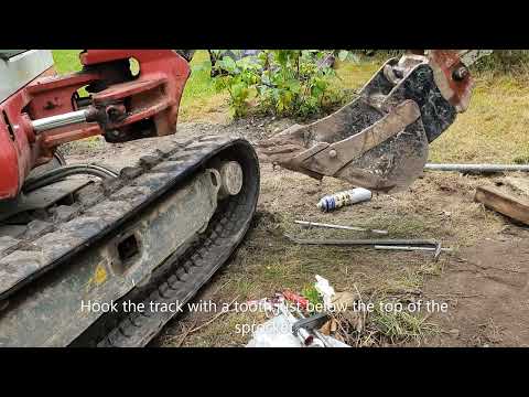 How to fix mini-digger excavator tracks back on - the EASY WAY in a few minutes! (Takeuchi TB216)