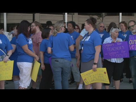 Akron Education Association holds rally ahead of board's vote on $24 million budget cut