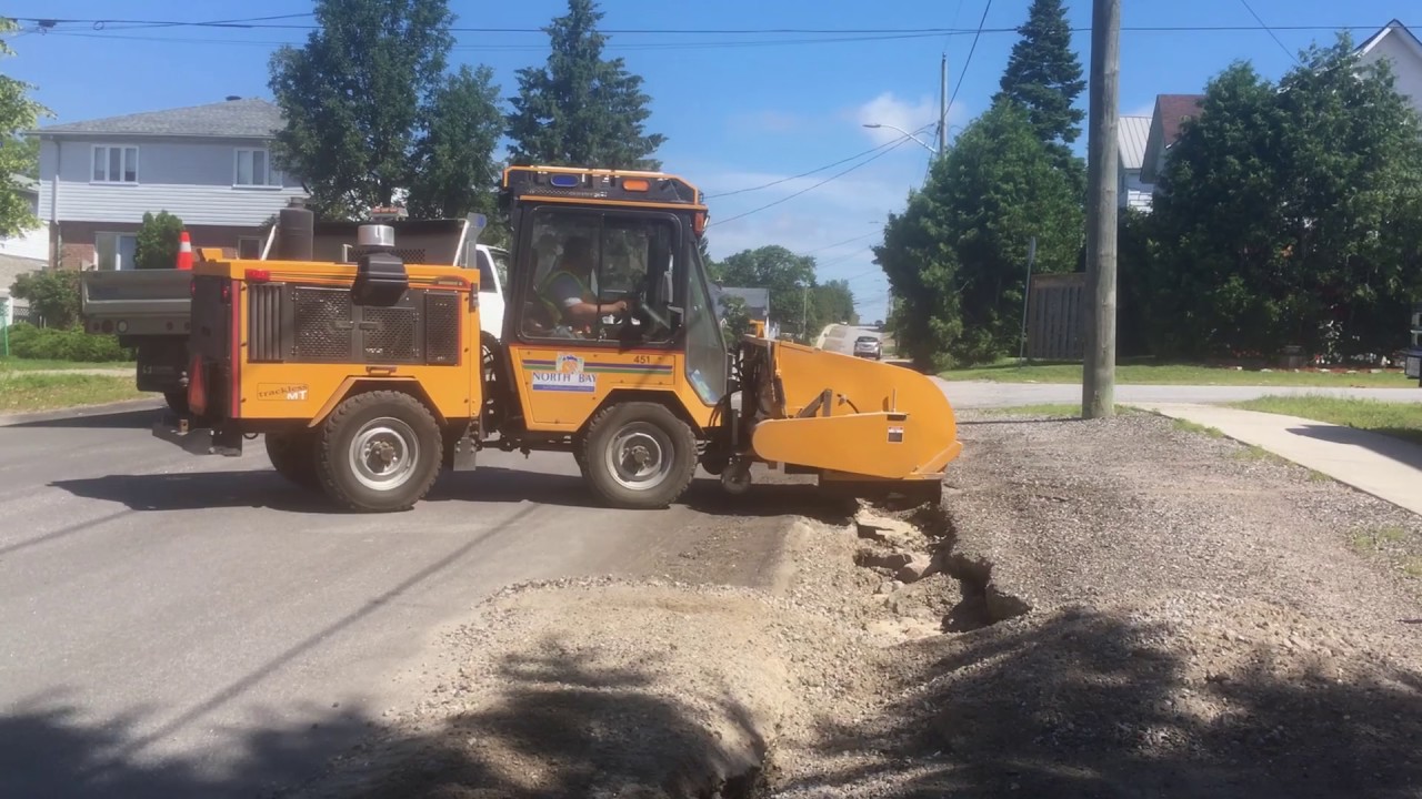 Trackless MT6 Sidewalk Tractor Pickup Sweeper