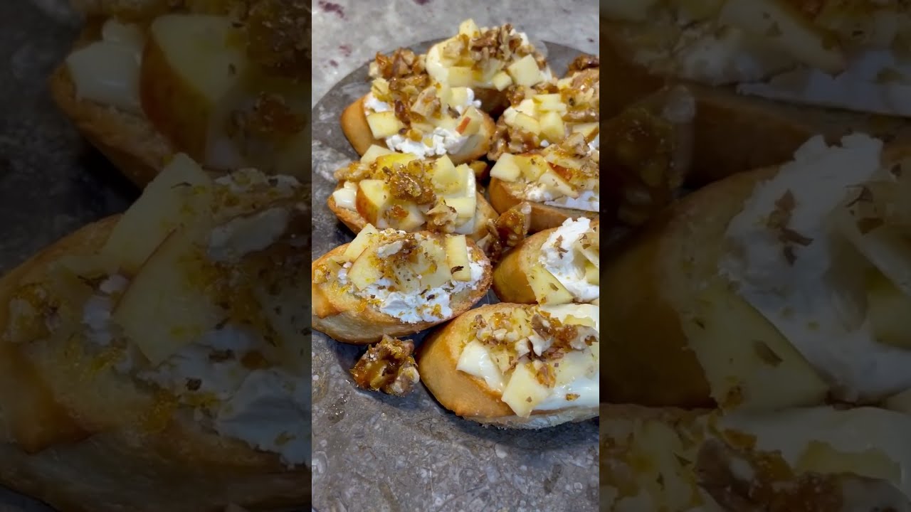 Candied Walnuts on Brie and Goat Cheese Crostini with apple pieces