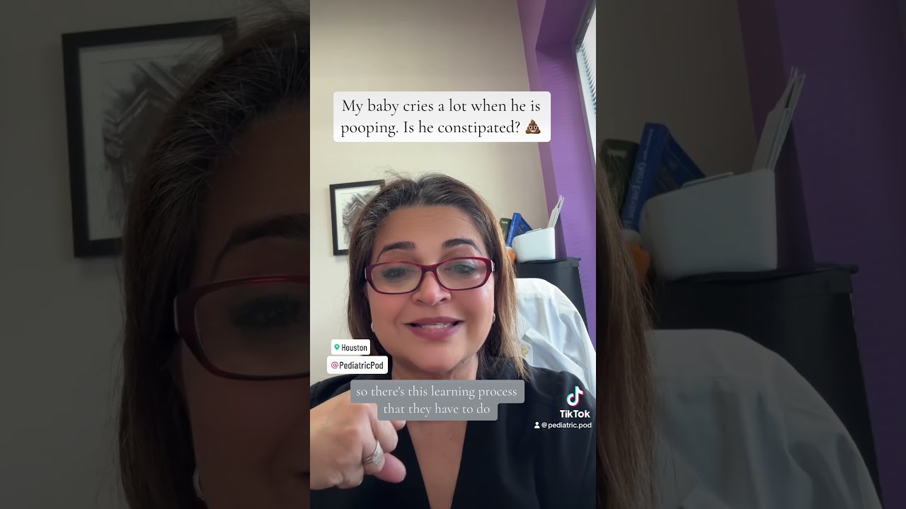 Why does my baby cry when she poops?