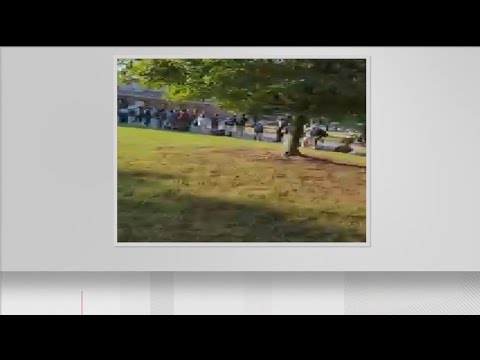 Chamblee middle school students wait in long line to clear metal detectors