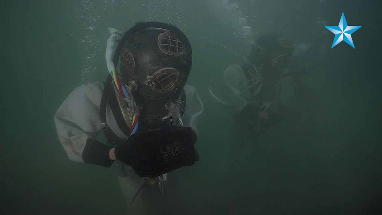 Divers use WWII-era gear for interment of USS Arizona crew member ...