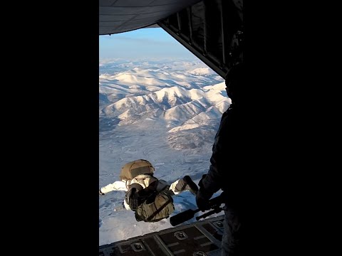 U.S. Air Force Airmen jump into freezing arctic conditions.