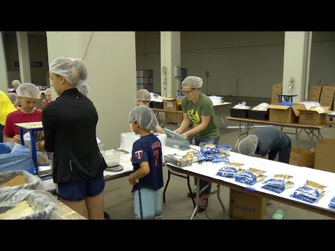 Maple Grove Girl Packs Food for Hungry