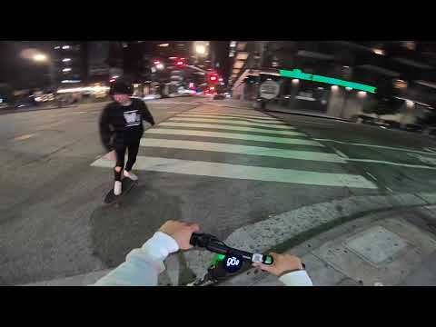 lime electric scooter point of view downtown of los angeles