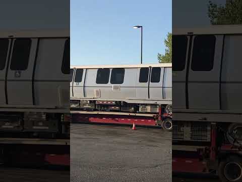 BART BA passenger car on semi trailer