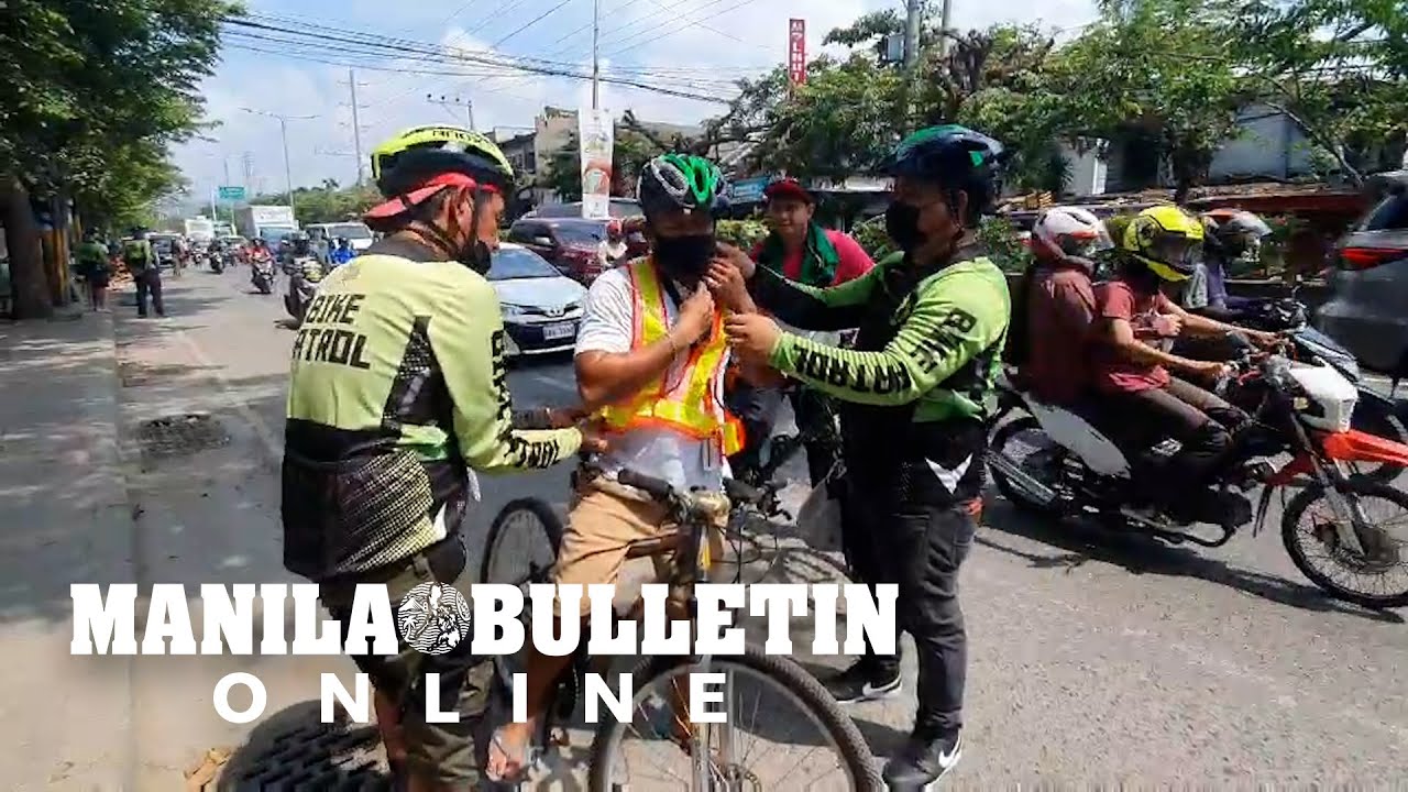 Sugbo Bike Lane Board Bike Patrols give free helmets and reflectorized vests to bike riders in Cebu