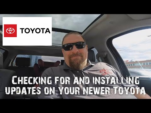 Checking for and installing a Toyota software update on the latest infotainment system.
