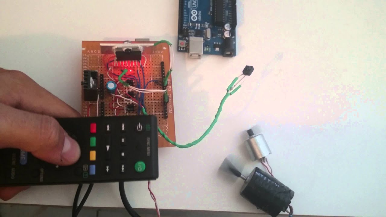 DIY IR controlled Arduino Motor Shield .