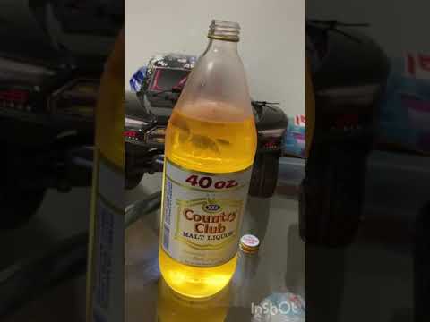 Enjoy a 40oz of Country Club XXX Malt Liquor