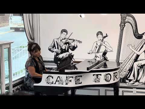 Jeeminn Lee performs at the grand opening of 2D Cafe Tornado in Towaco, NJ in January 2024