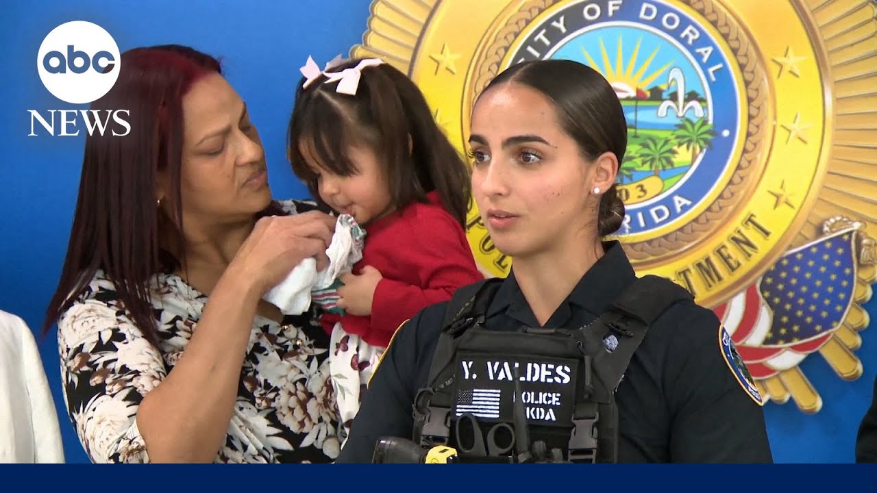 Florida police officers reunite with toddler they saved from near-drowning
