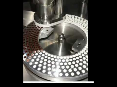 Filling of capsules Auger fill principle
