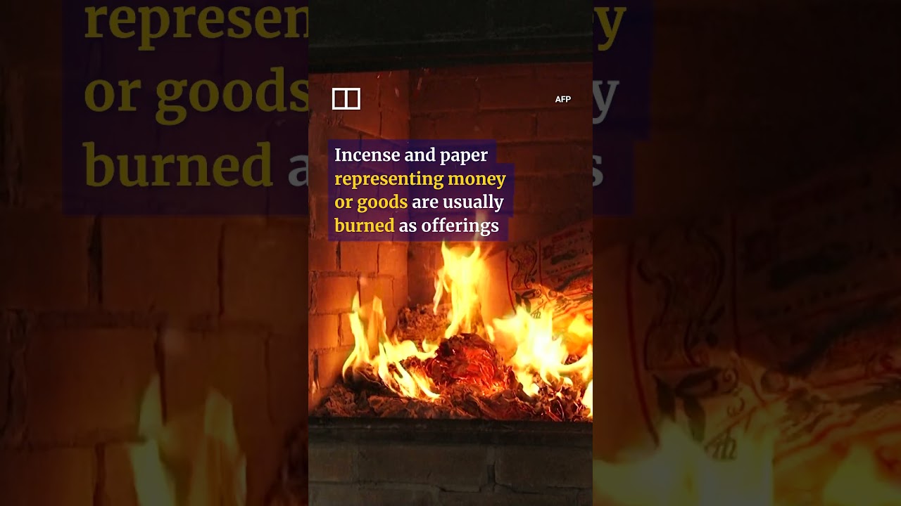 Paper AI robot offerings for tomb-sweeping festival