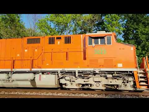 CN's EJ&E 3023, CN 3374 Westbound train with PRAXAIR tank car at Vicksburg, MI