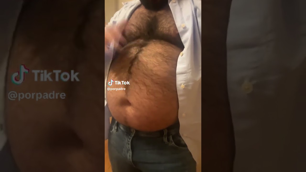 Big Beefy Shirtless Hairy-chest Muscle Bear: showing off his very hairy belly  - Age-Restricted