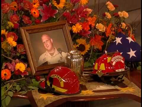 Detroit Lakes Police Sergeant Tim Eggebraaten sings "Amazing Grace" at Deputy Chris Dewey's funeral.