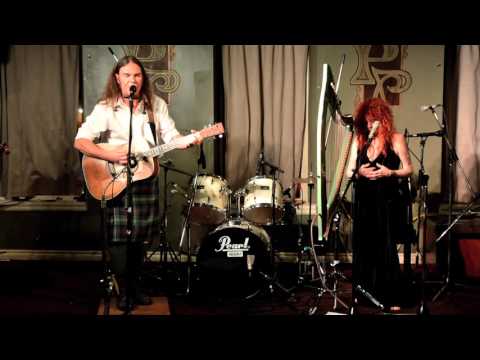 Doug Feaver performing his song “He Delivered the Mail” with his Celtic ...