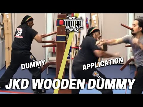 Jeet Kune Do instructor works on Choy Li Fut wooden dummy