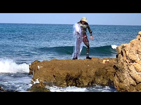 I fish with a net from a stone