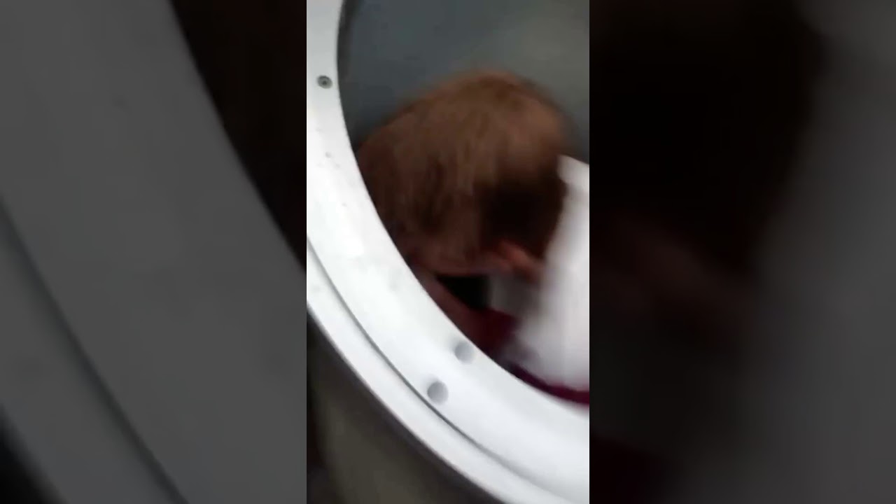 Kid falls down trash compactor