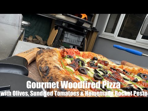 Gourmet Woodfired Pizza with Olives, Sundried Tomatoes & Homemade Rocket Pesto