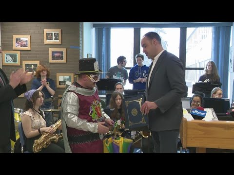 Kenmore East honors its Grammy-nominated high school band director