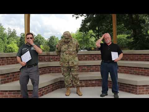 Lieutenant Colonel Matt Reumler Presents Certificates of Appreciation to Mutarelli and Jones