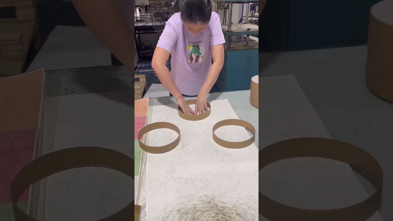 Step 4 of making the round box, securing the paper for the lid #giftbox #roundbox #boxfactory