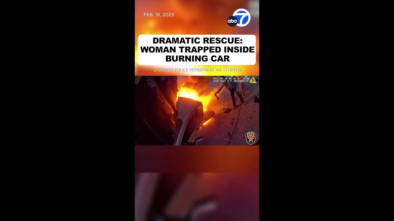 Dramatic rescue: Woman trapped inside burning car
