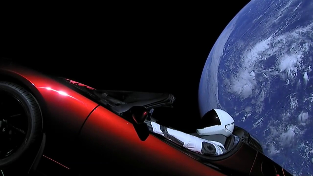 Tesla Roadster & Starman in Space, with Earth in Background