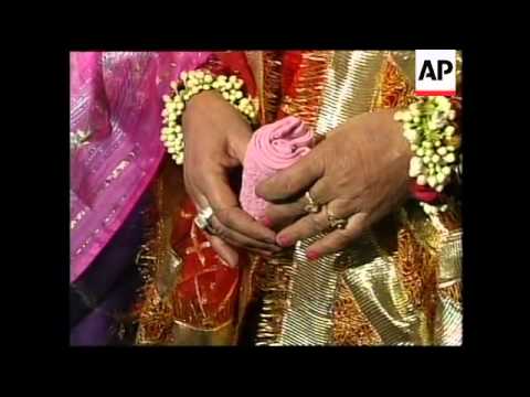INDIA: WOMEN IS MARRIED TO A PORTRAIT