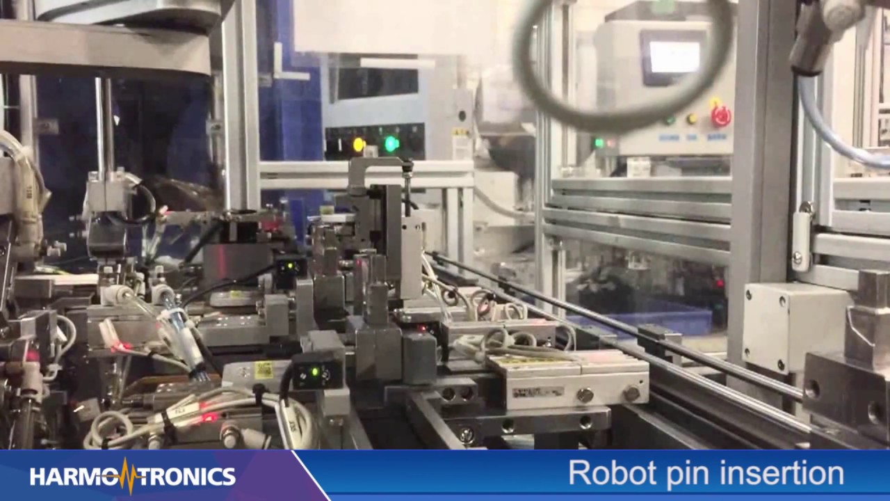 Robot pin insertion