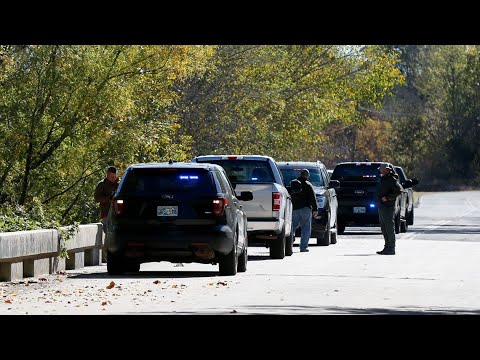 Police: Four men found dead in eastern Oklahoma river, one person in custody