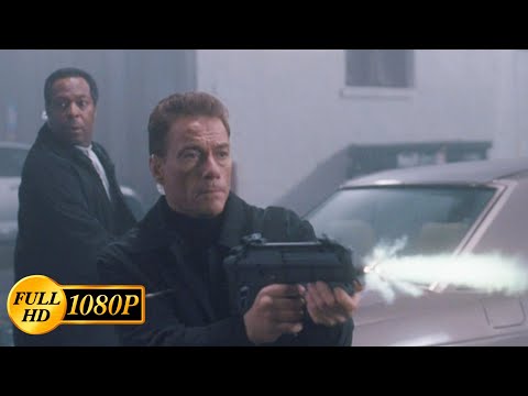 Jean-Claude Van Damme fights off bandits in a car with a submachine gun / The Hard Corps (2006)