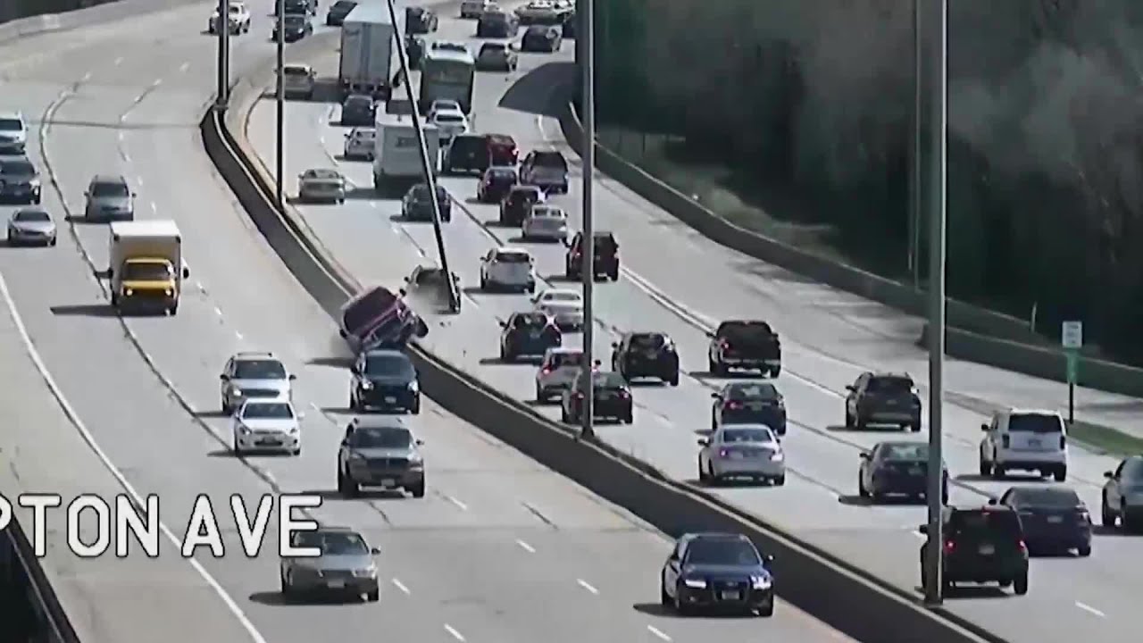RAW VIDEO: WI Truck Jumps Freeway Median, Brings Down Light Poles