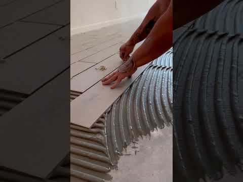 Installing tile floor #tile #tiling #contractor #constructiontips