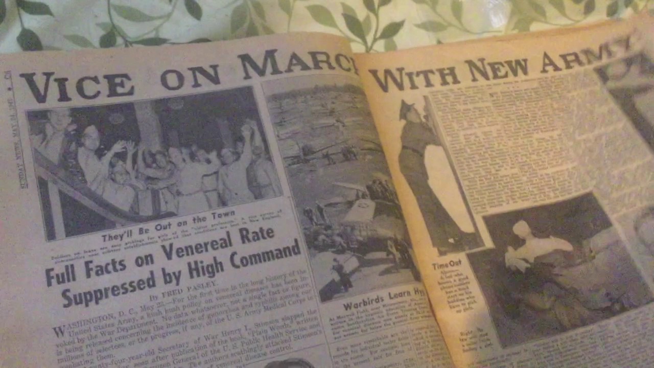 Unbagging  WW2 Newspaper