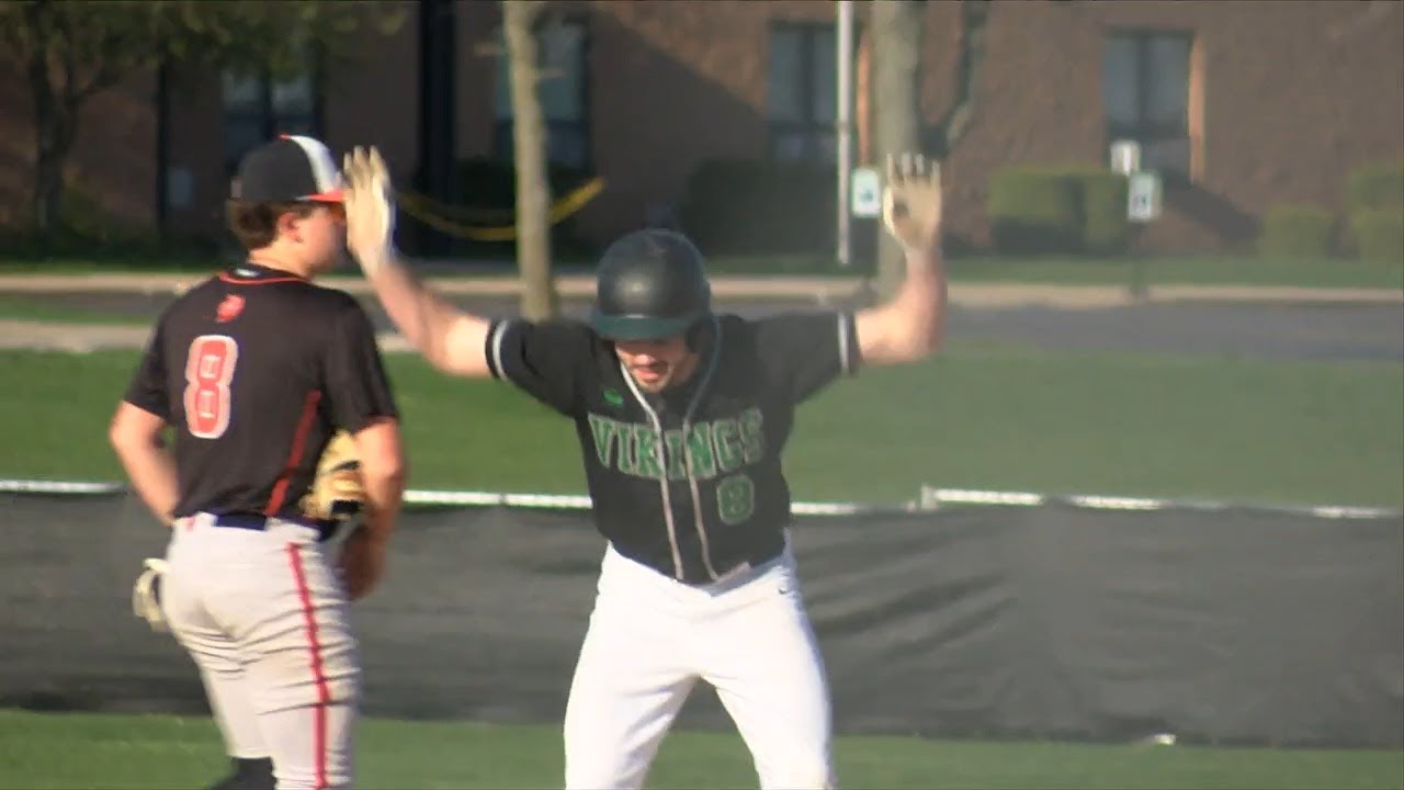 North Boone Baseball score 8 fourth inning runs to hand Byron their first conference loss of the