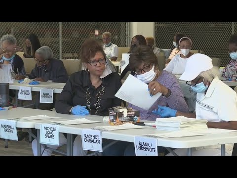 Elections workers count DeKalb County commission race by hand