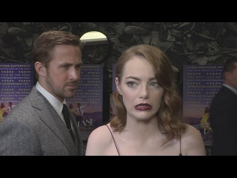 La La Land gala: Ryan Gosling creeps up on Emma Stone!
