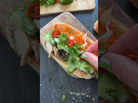 Banh Mi is a Vietnamese short baguette with thin, crisp crust and soft, airy texture.