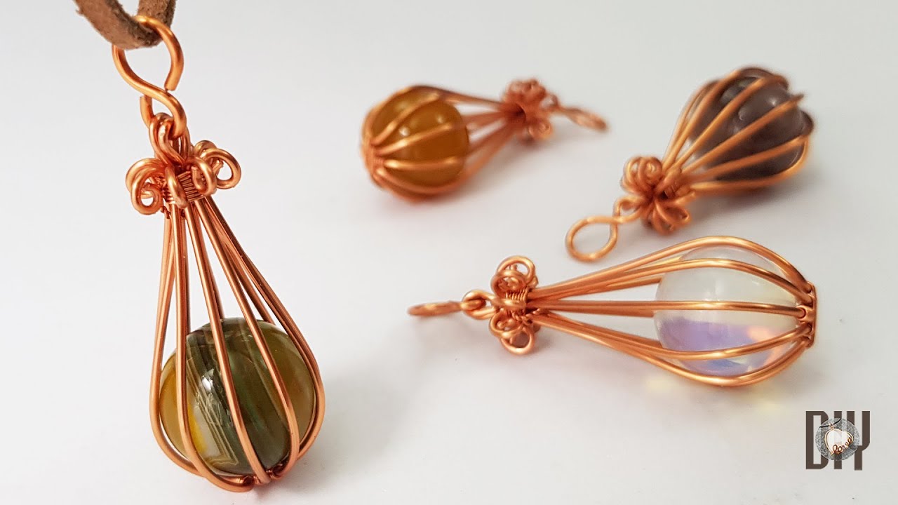 Water Drop cage pendant with large spherical stone without holes 471